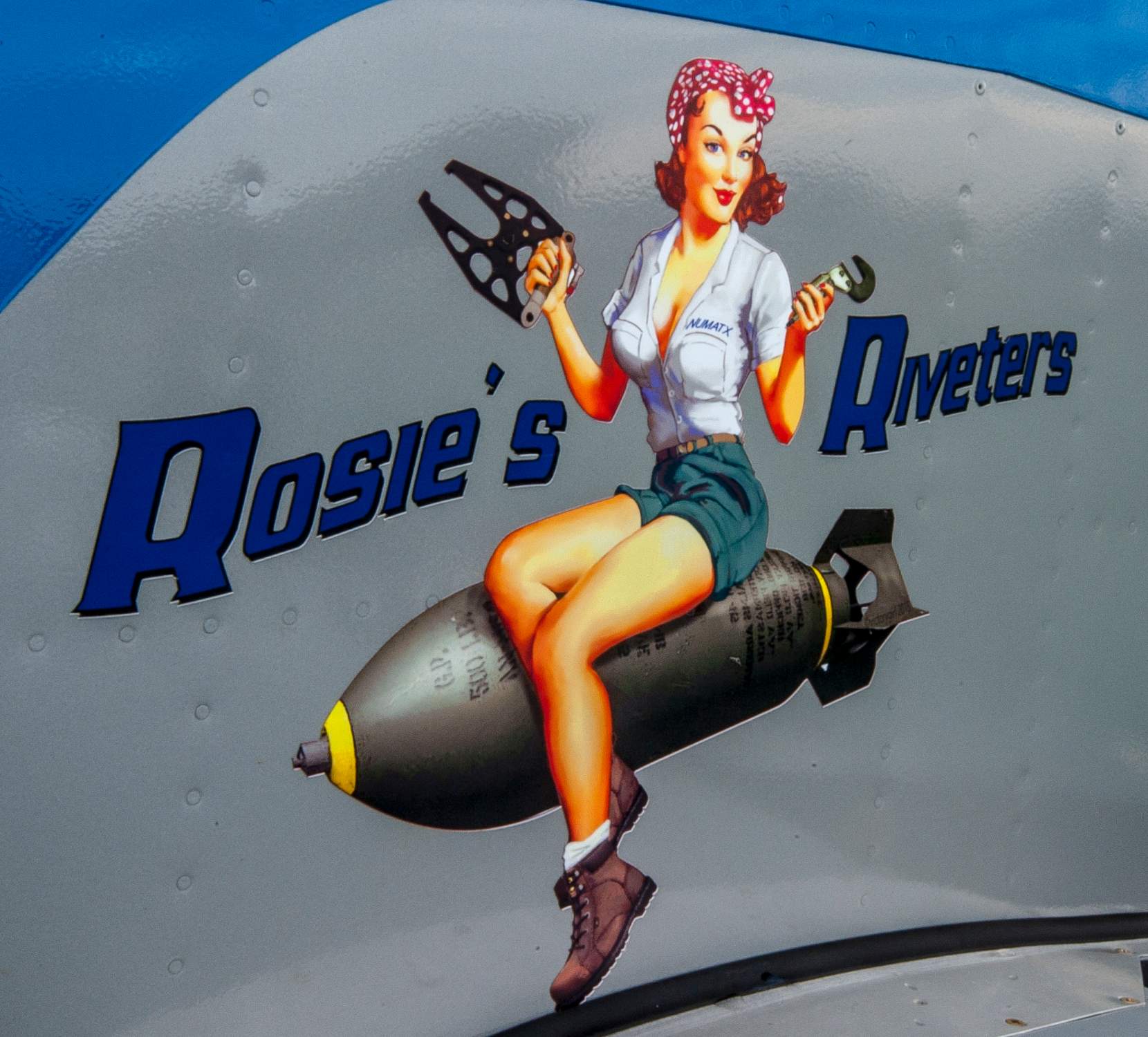 Solve Rosie the Riveter Nose Art jigsaw puzzle online with 210 pieces