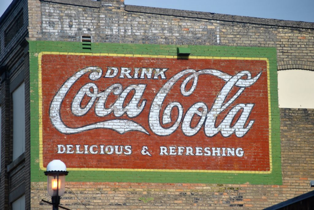 Solve Coca Cola Ghost Sign 1 jigsaw puzzle online with 54 pieces