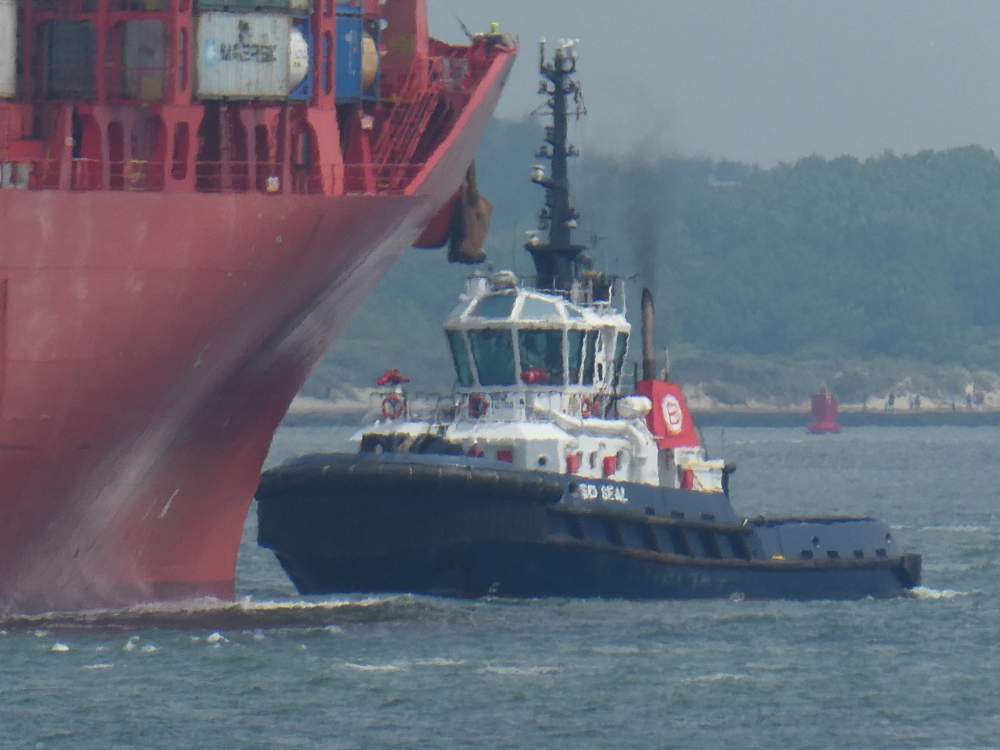 Solve The front tug is now connecting with the stern of the container ...