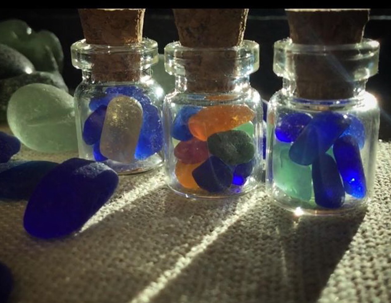 Solve Vials of sea glass jigsaw puzzle online with 63 pieces