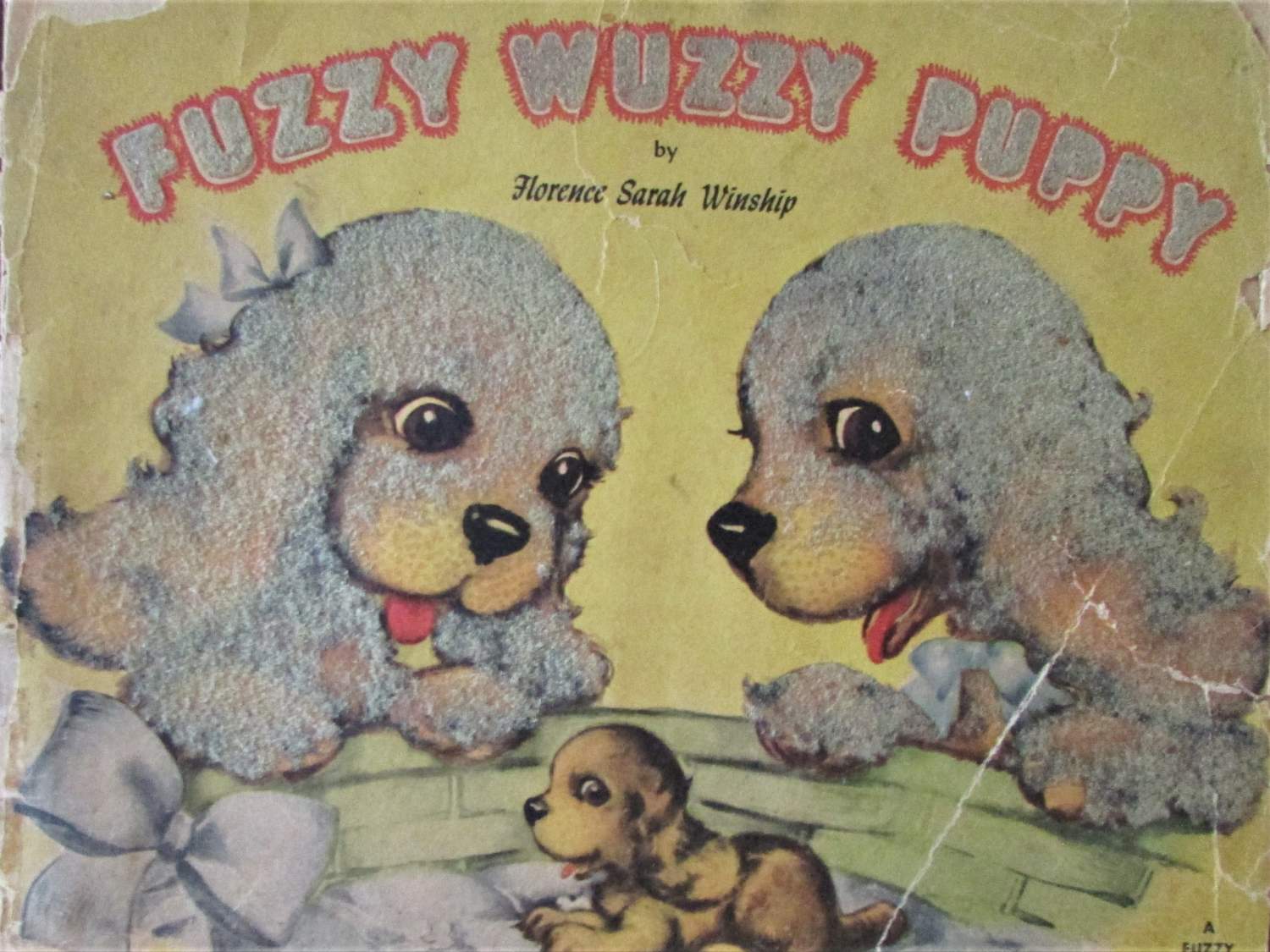 Solve Fuzzy Wuzzy Puppy jigsaw puzzle online with 63 pieces