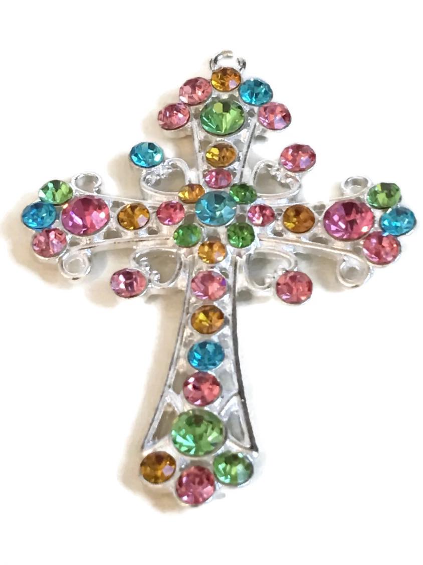 Solve A Beautiful Jeweled Cross jigsaw puzzle online with 63 pieces