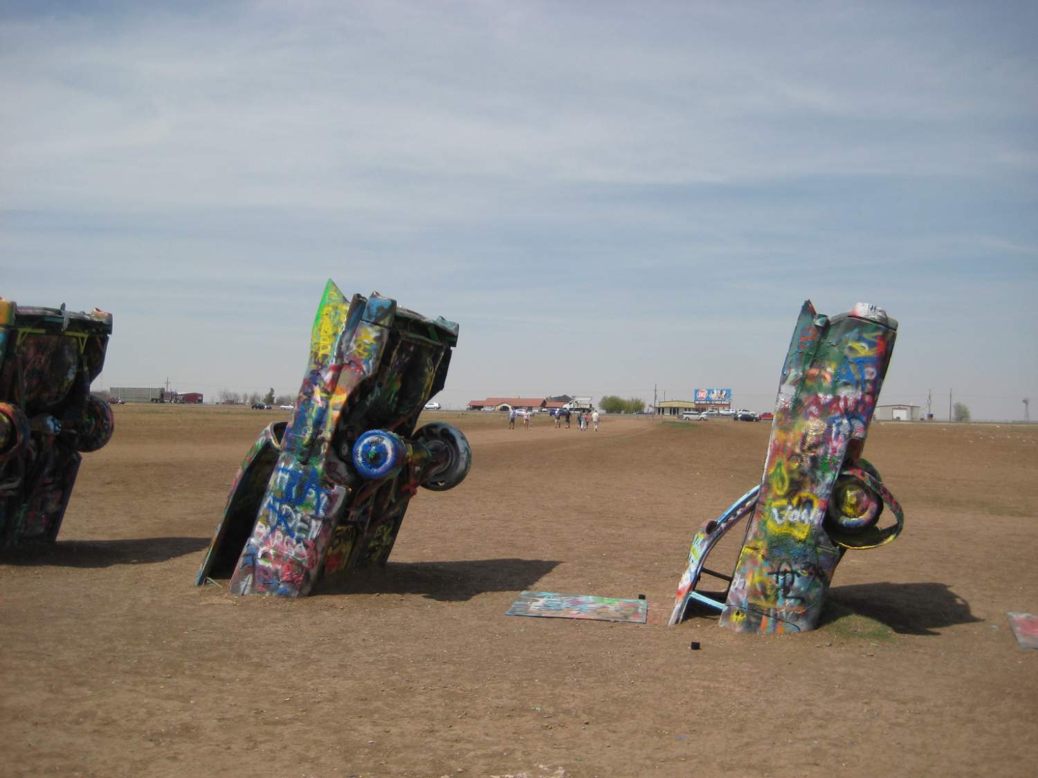 Solve CADILLAC RANCH AT AMARILLO TEXAS jigsaw puzzle online with 48 pieces