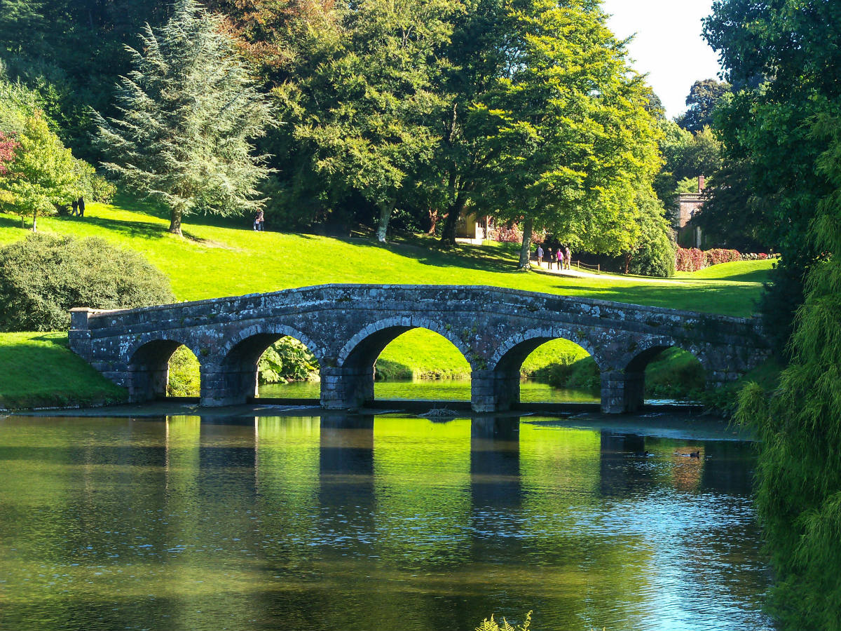 Solve Bridge at Stourhead, Wiltshire jigsaw puzzle online with 108 pieces