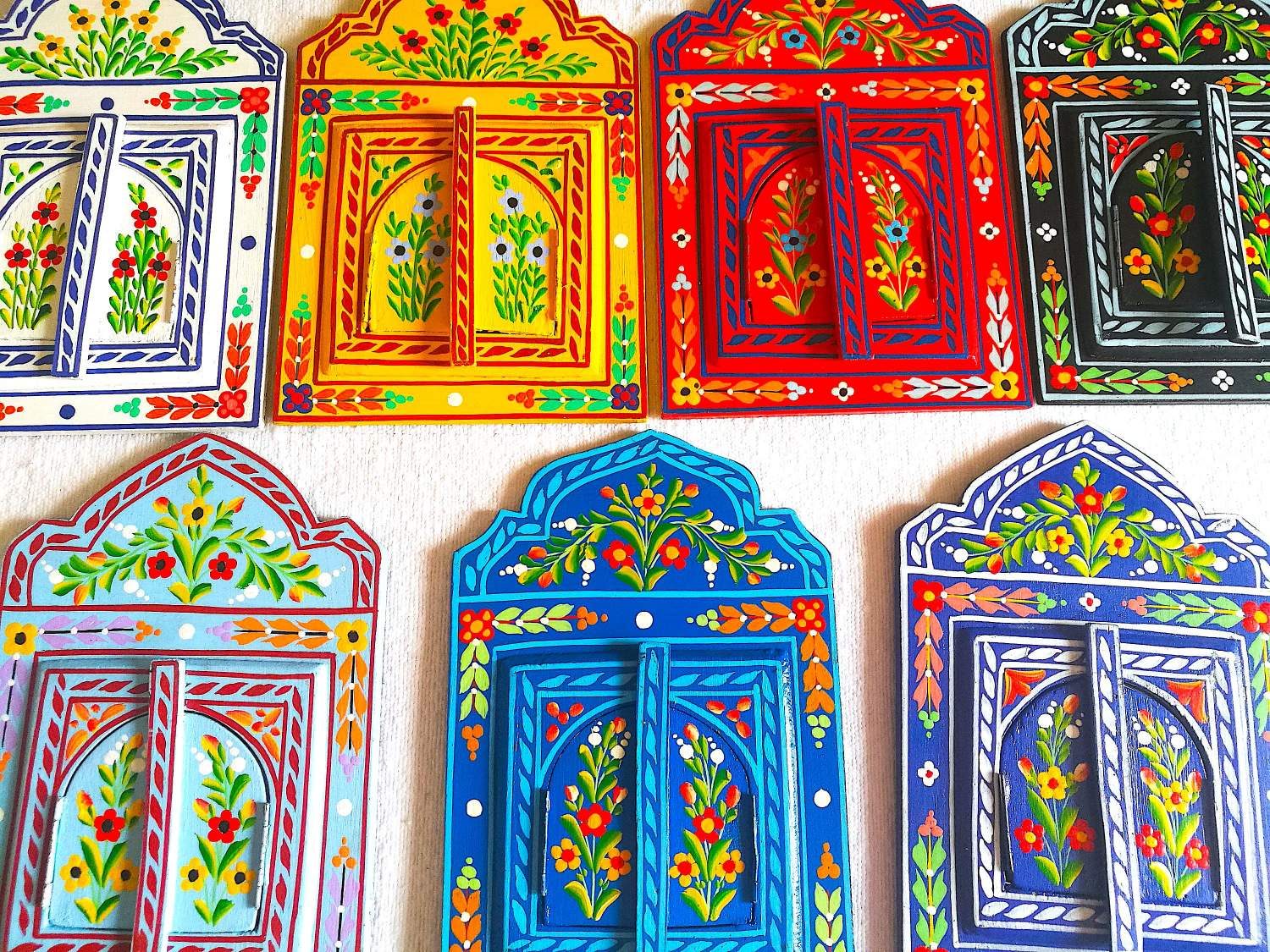 Solve Handpainted Moroccan doors jigsaw puzzle online with 99 pieces