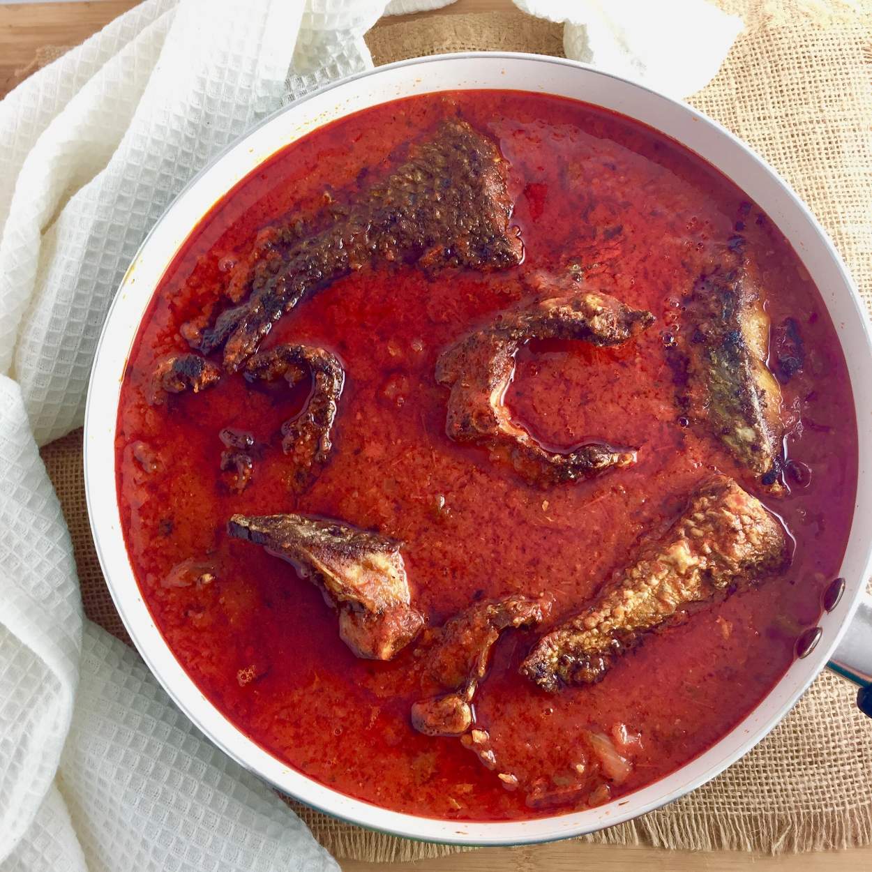 Solve Nigerian Croaker Fish Stew jigsaw puzzle online with 100 pieces