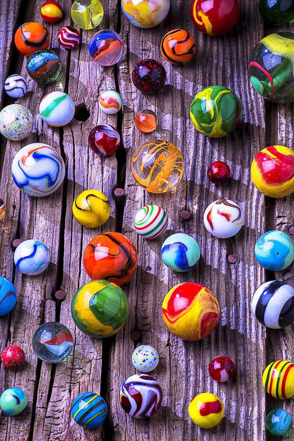 Solve Marbles on Wood jigsaw puzzle online with 150 pieces