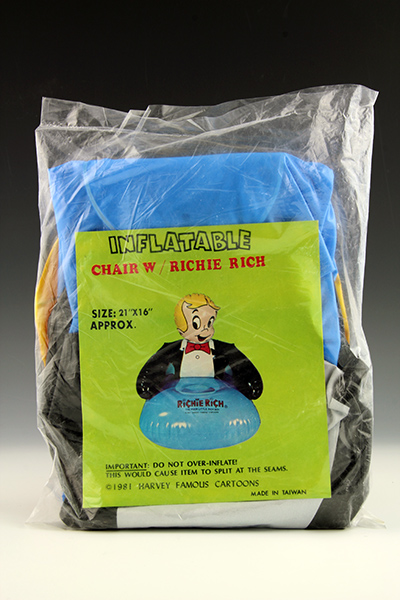 Solve Richie Rich Inflatable Chair jigsaw puzzle online with 54 pieces