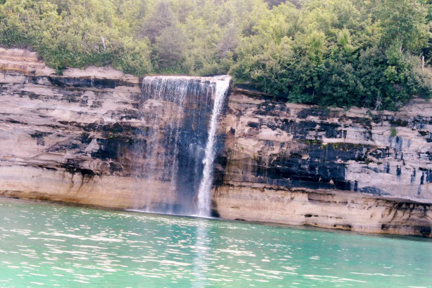 Solve Pictured Rocks Water Fall jigsaw puzzle online with 35 pieces