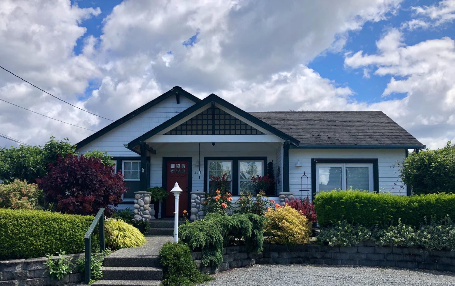 Solve Another pretty little house in the neighborhood jigsaw puzzle ...