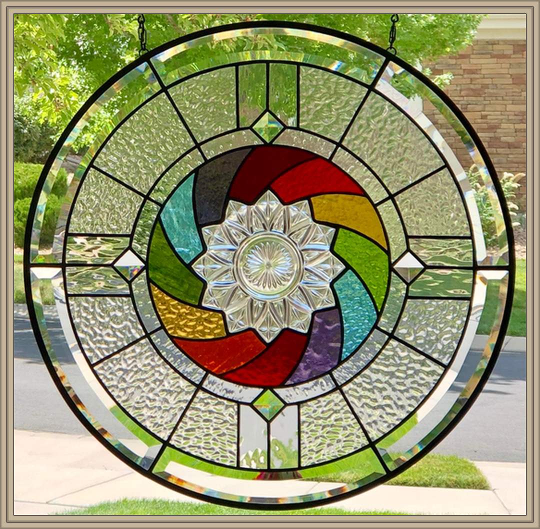 Solve Bright stained glass light catcher! jigsaw puzzle online with 64 ...