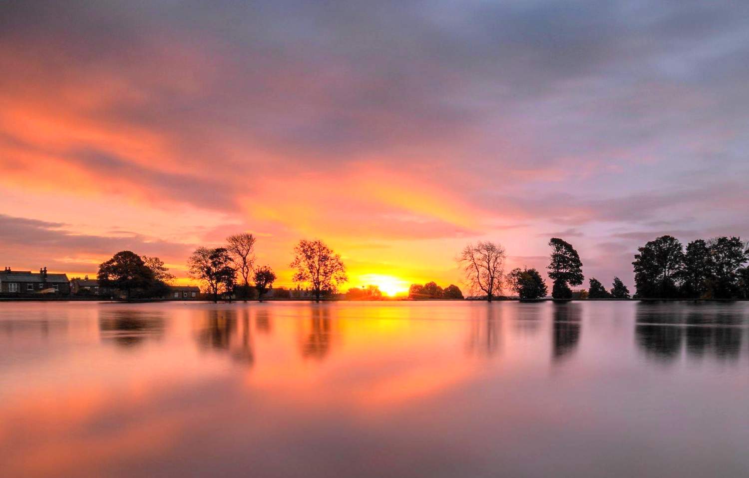 Solve Sunrise in Harold Park Bradford jigsaw puzzle online with 77 pieces